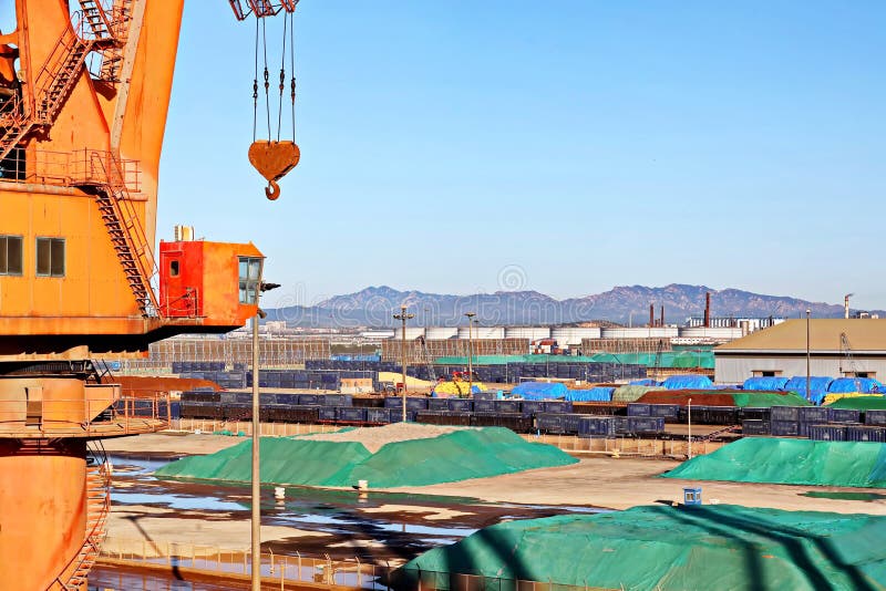 Cargo Terminal for Unloading Bulk Cargoes by Shore Cranes. Views of the ...