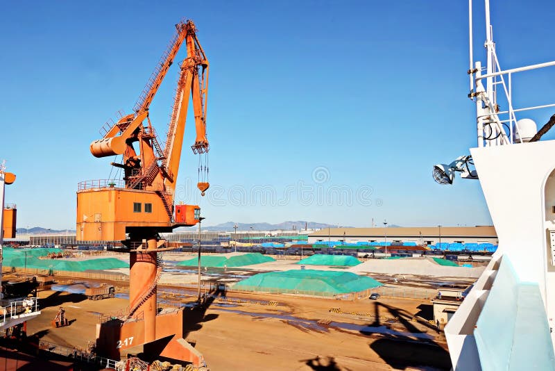 Cargo Terminal for Unloading Bulk Cargoes by Shore Cranes. Views of the ...