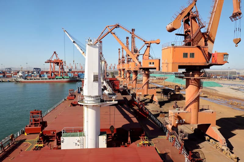 Cargo Terminal for Unloading Bulk Cargoes by Shore Cranes. Views of the ...