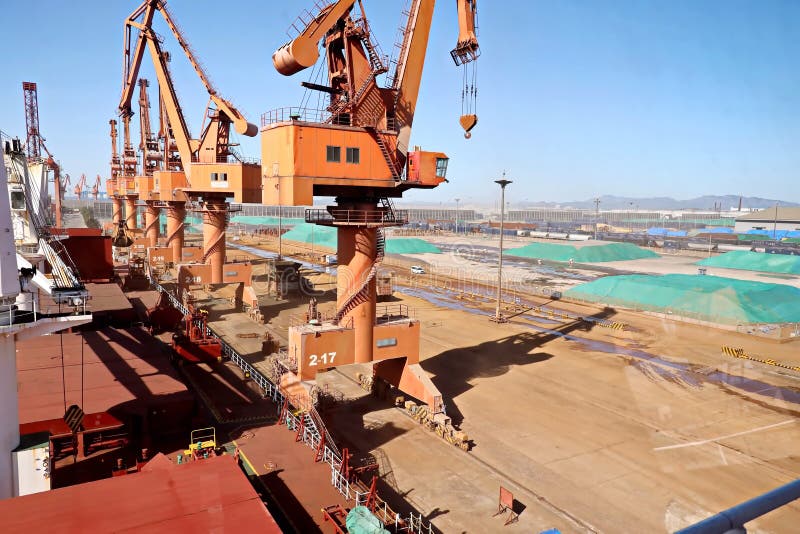 Cargo Terminal for Unloading Bulk Cargoes by Shore Cranes. Views of the ...