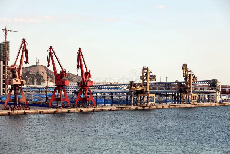Cargo Terminal for Unloading Bulk Cargoes by Shore Cranes. Views of the ...
