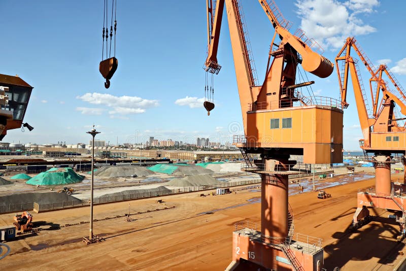 Cargo Terminal for Unloading Bulk Cargoes by Shore Cranes. Views of the ...