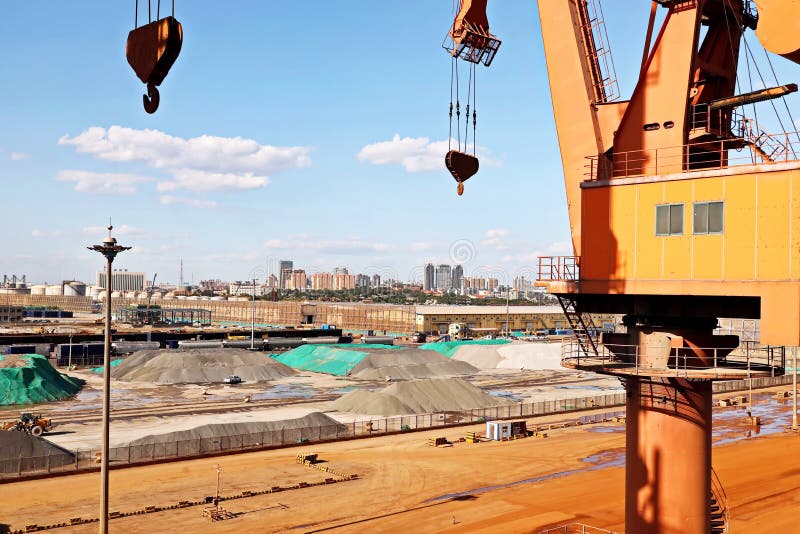 Cargo Terminal for Unloading Bulk Cargoes by Shore Cranes. Views of the ...