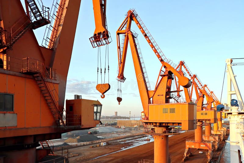 Cargo Terminal for Unloading Bulk Cargoes by Shore Cranes. Views of the ...