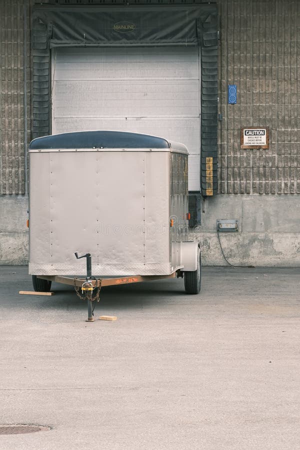 Cargo Trailer Parked in Front of Factory Loading Bay Stock Photo ...