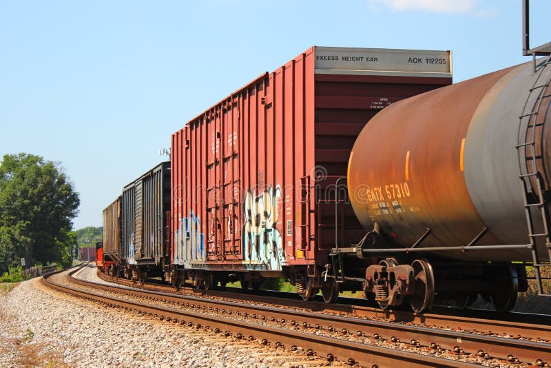 Trains of Oil Tanks and Wagons on the Cargo Railway Station Stock Photo ...