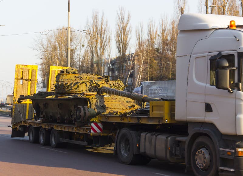 Cargo Train Carrying Tanks on a Freight Platform Stock Photo - Image of ...