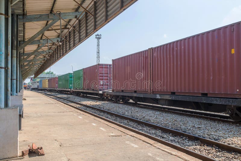 Cargo train in station stock photo. Image of boxcar, springs - 97743718