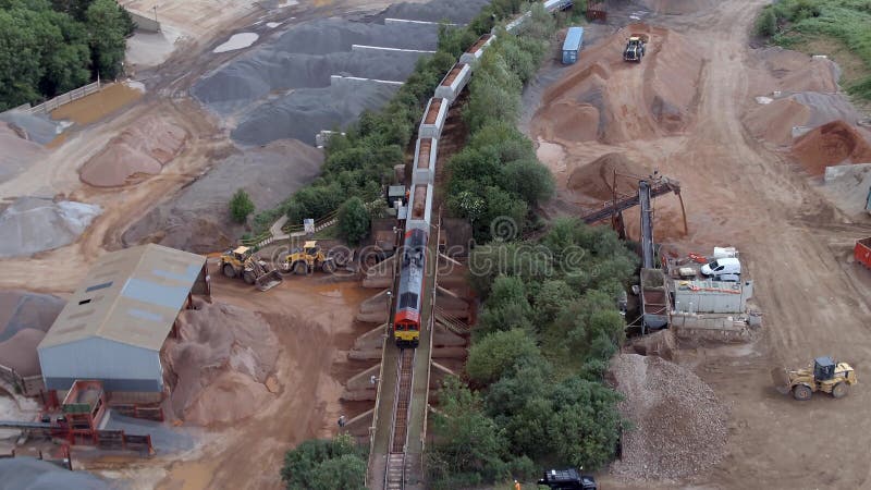 Cargo Train Stopped at an Asphalt Processing Plant Stock Footage ...