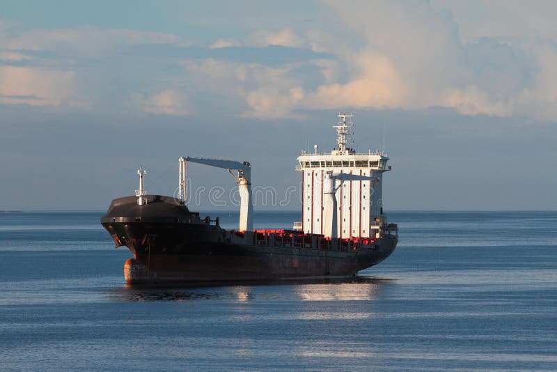 Cargoship on raid in sea stock image. Image of cargoship - 69735427