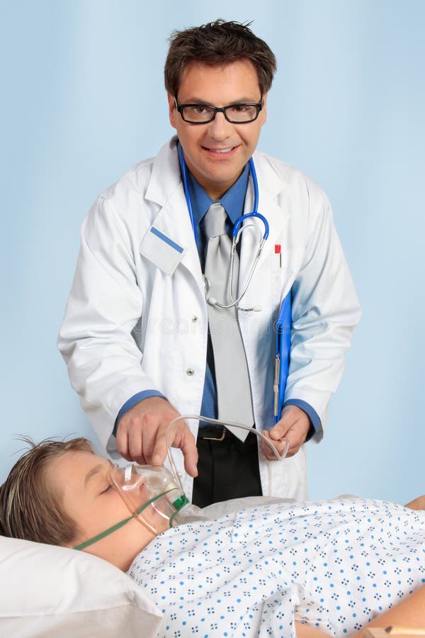 Caring Doctor Assisting Patient Stock Image - Image of healthcare ...