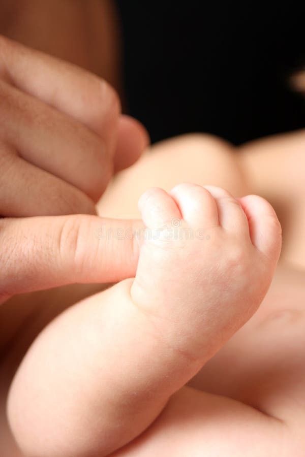 A Caring Hand stock image. Image of tender, child, squeezing - 2836209