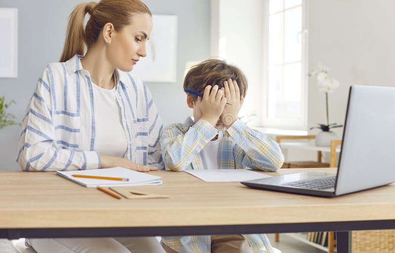 Caring Mother Supporting Sad and Crying Son Doing Homework Stock Image ...