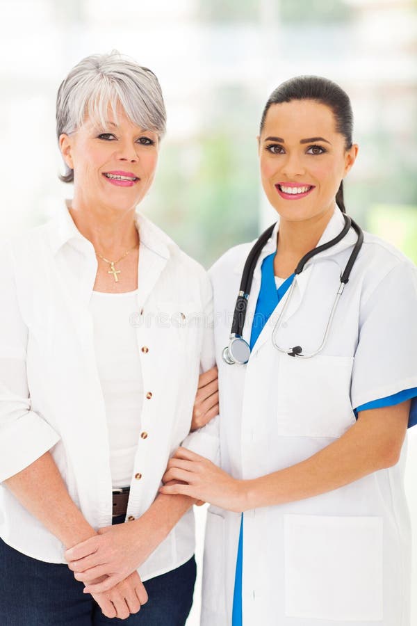 Caring Nurse Holding Elderly Hands Stock Photo - Image of concept ...