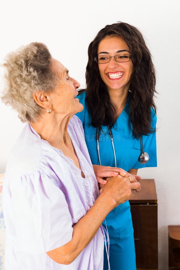 Caring Nurses stock photo. Image of elderly, help, homecare - 35026042