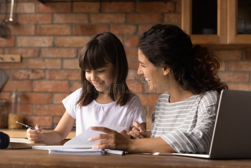 Caring Young Mom Help Small Daughter with Homework Stock Image - Image ...