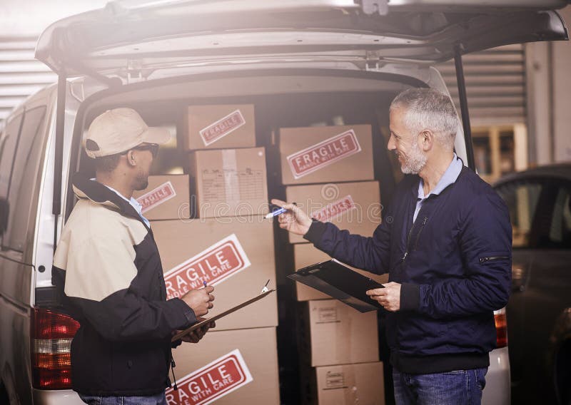 Caring for Your Precious Cargo. Two Delivery Men Having a Discussion ...