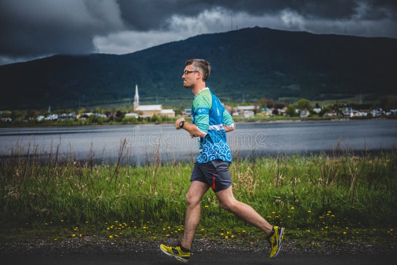 Lonely Man Leading a Group of 10K Runners Editorial Photography - Image ...
