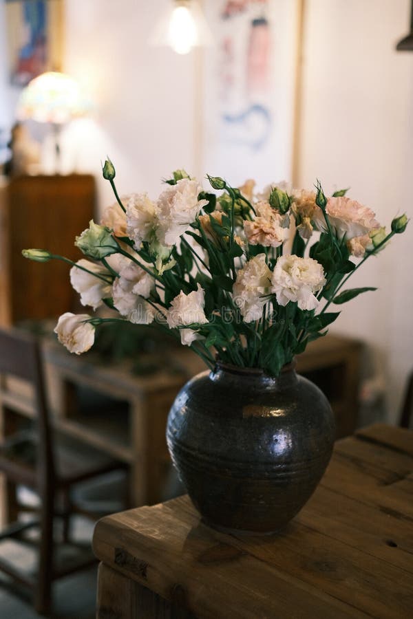 The Carnation Arrangement on the Table Stock Photo - Image of flowerpot ...