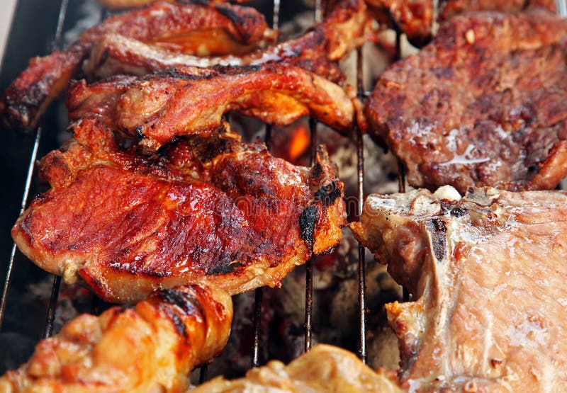 Carne Sabrosa En La Parrilla Imagen de archivo - Imagen de persona ...
