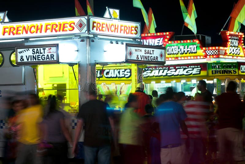 Carnival Goers Walk among Fast Food Vendors Editorial Image - Image of ...