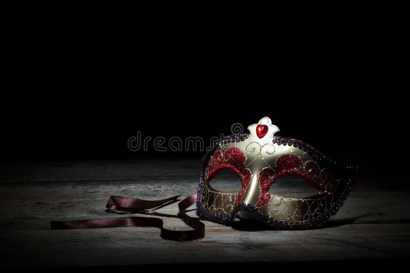 Carnival Mask on old wood stock image. Image of aged - 302543481