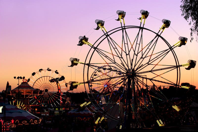 Carnival at Dusk stock image. Image of outdoor, city, funfair - 4113399