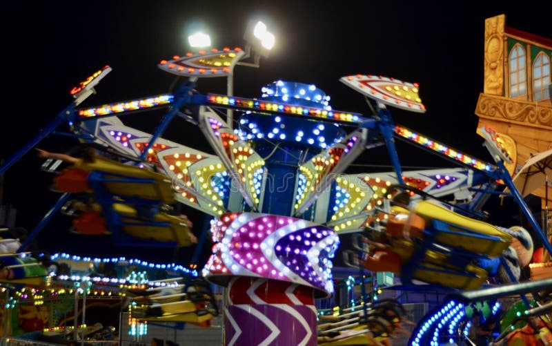 Carnival Ride stock image. Image of ride, colorful, nighttime - 123547629