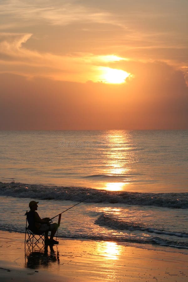 Carolina Beach Fisherman stock photo. Image of surf, dawn - 2267100