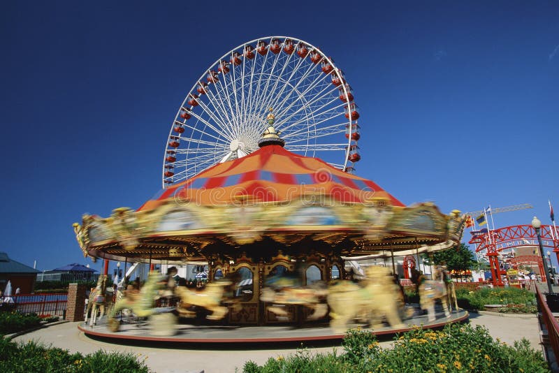 Carousel at amusement park editorial stock image. Image of ride - 23161274