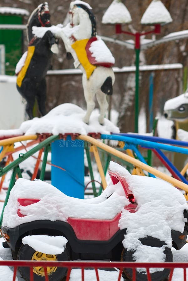 Carousel car in snow stock photo. Image of park, cycles - 12609128
