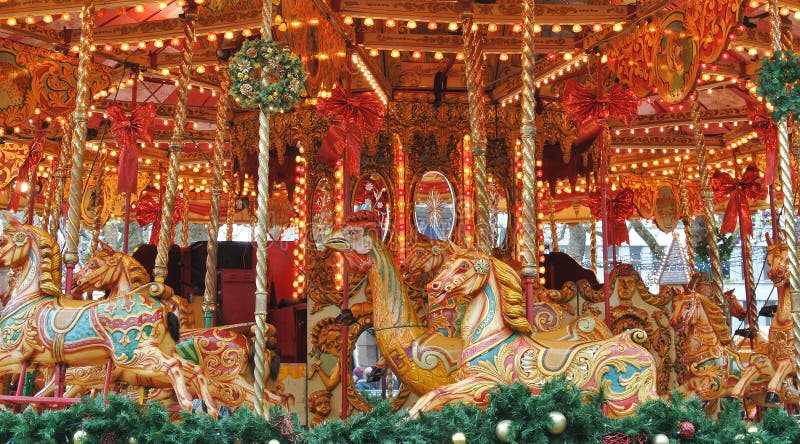 Traditional Carousel with Wooden Horses in an Italian Town Stock Photo ...