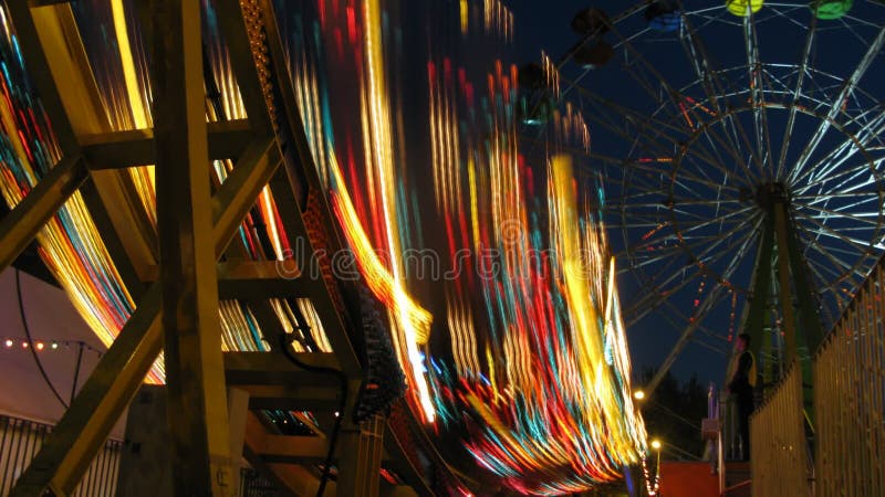 Carousel Disko and Observation Wheel are Fly Round Stock Footage ...
