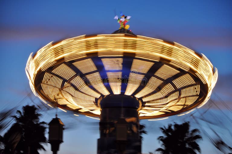 Carousel Disney Adventure editorial photography. Image of chairs - 22809057