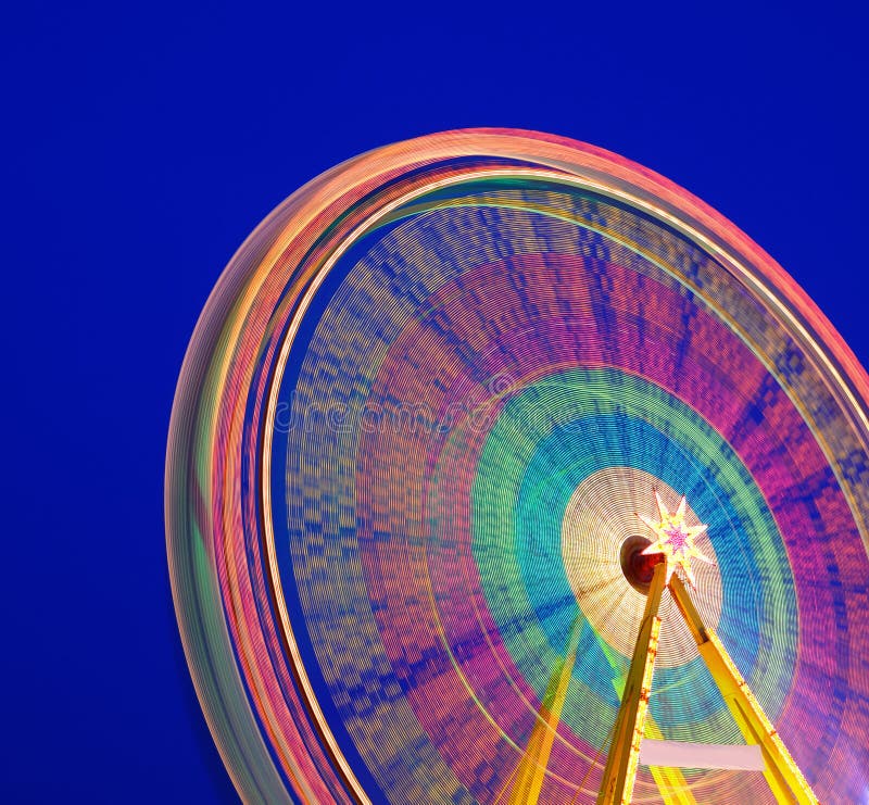 Carousel. Ferris Wheel on a Blue Background Stock Photo - Image of ...