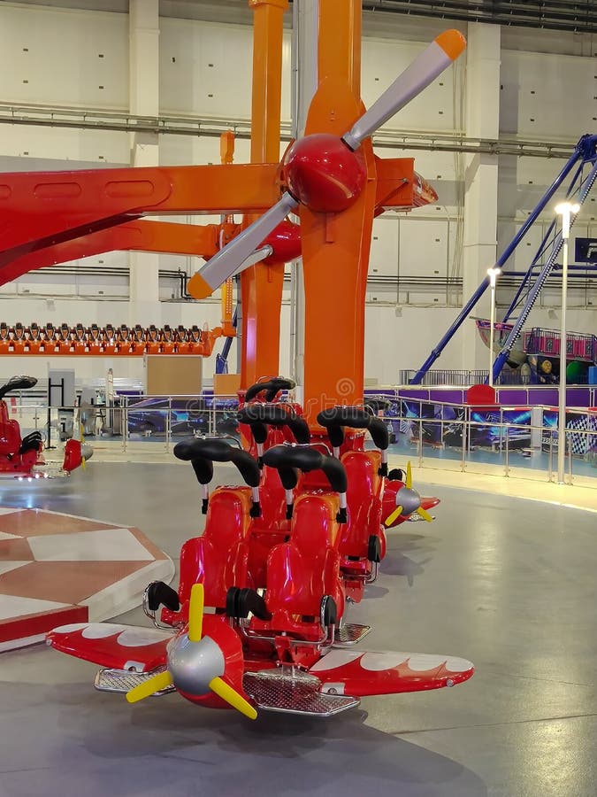 Carousel in the Form of a Cartoon Airplane with Two Seats and ...