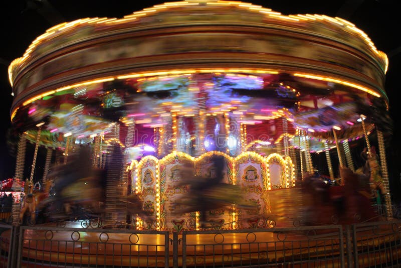 Carousel Moving at Night stock image. Image of blur, carousel - 28273741