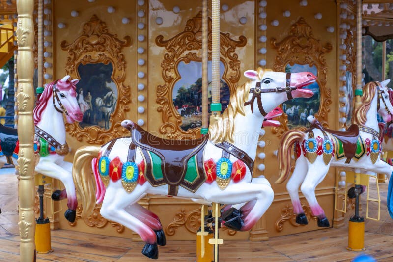 The carousel in the park stock image. Image of hobbyhorse - 203191513