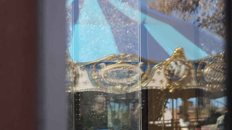 Carousel reflection stock video. Video of window, round - 87469247