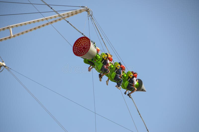 Carousel Rotating and Turning the People Upside Down Editorial Photo ...