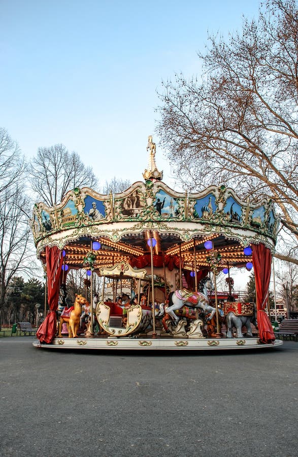 Traditional Carousel with Wooden Horses in an Italian Town Stock Photo ...