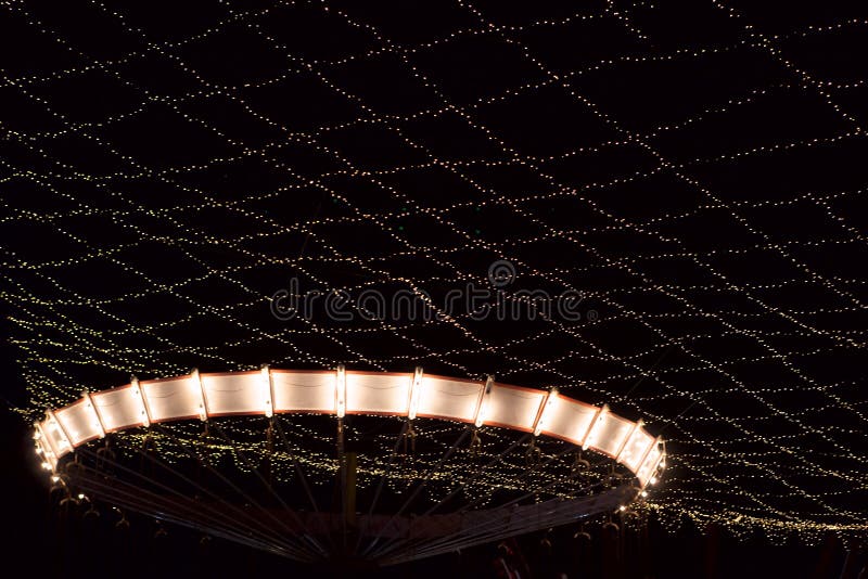 Carousel with Street Lighting Stock Photo - Image of dark ...