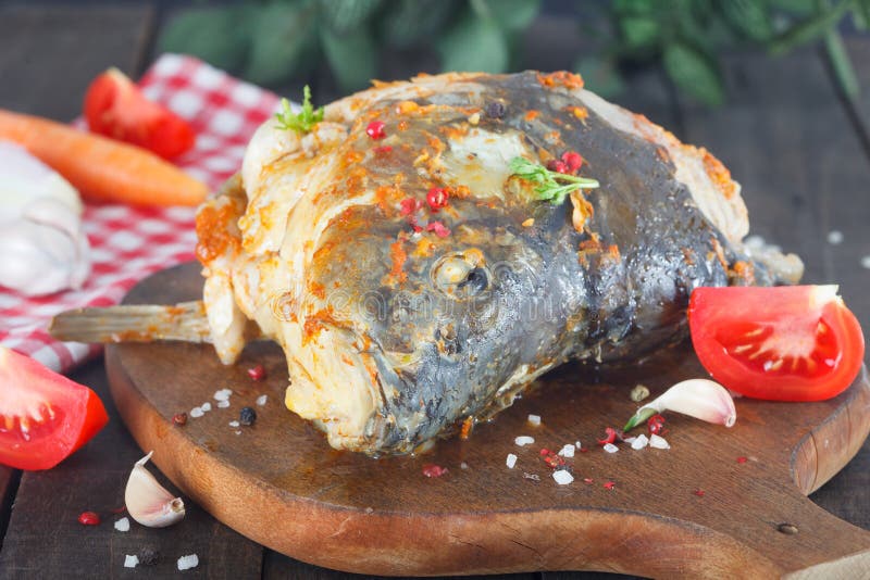 Carp Fish Head Cooked and Served with Vegetables Stock Photo - Image of ...