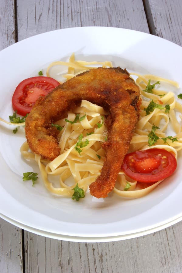 Carp Fried Steak with Tomato on Pasta Stock Photo - Image of fish, carp ...