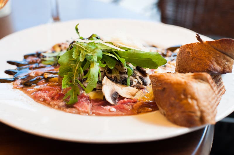 Carpaccio Food on the Table with Bread. Stock Image - Image of cold ...
