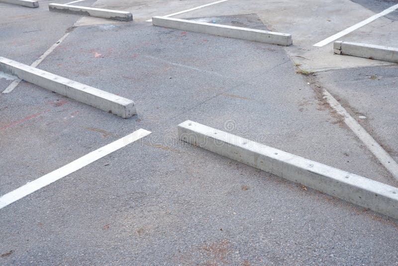 A Carpark Barrier with White Traffic Lines on Ground Floor Stock Image ...