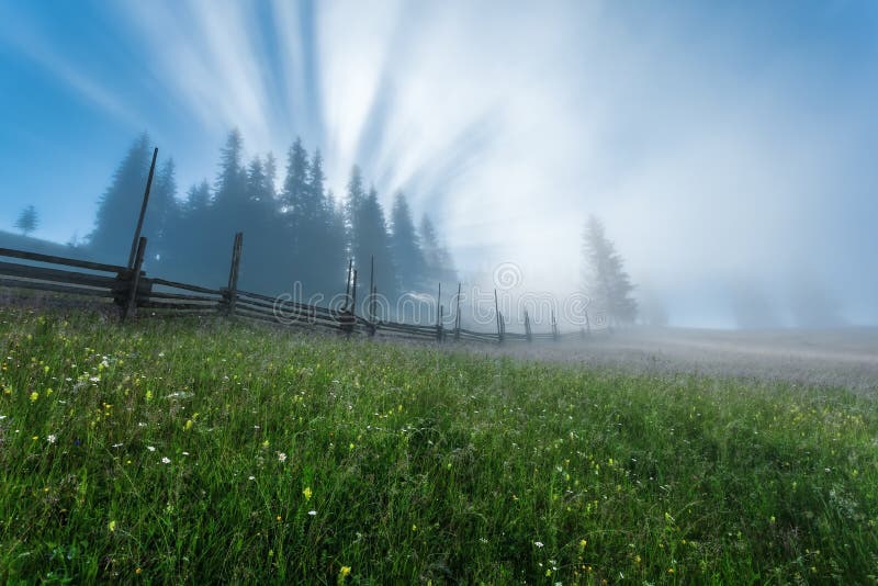 Carpathian Mountains. the Rays of the Rising Sun Streaming through the ...