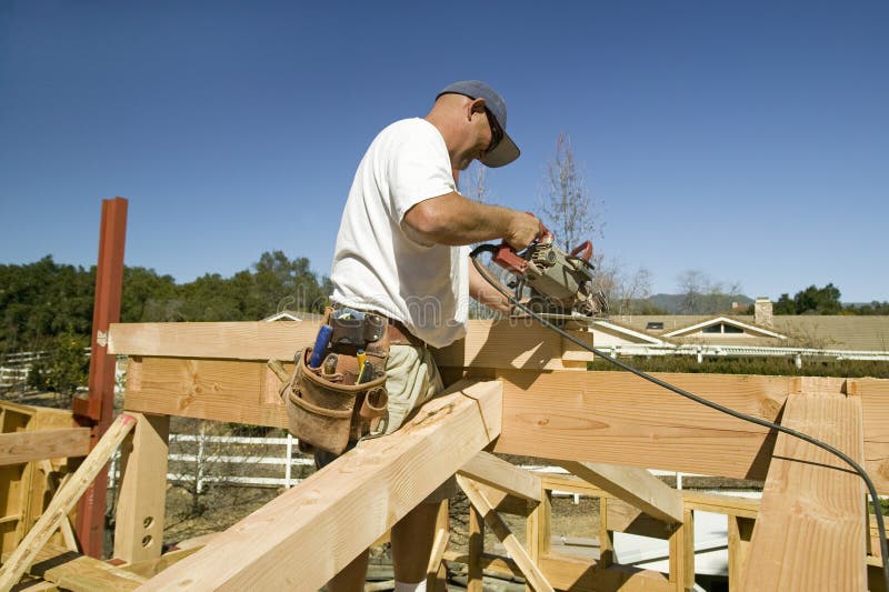 Contractor Shopping Lumber stock photo. Image of renovate - 2176316