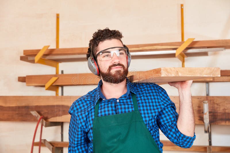 Carpenter Apprentice Carries Wood Beams Stock Image - Image of collar ...