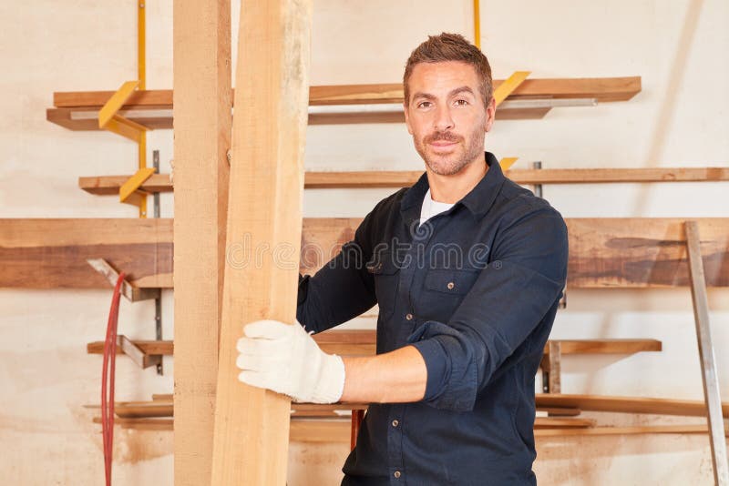 Carpenter Apprentice Carries Wooden Beams Stock Image - Image of ...